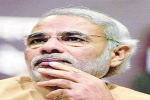 Modi picks his pet babus to run state info panel | Ahmedabad News - The ...