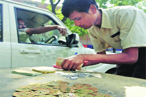 Token system started at parking lots | Chandigarh News - The Indian Express