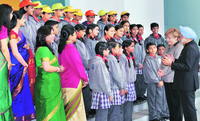 Delhi KV students embrace German,chit chat with Chancellor Merkel ...