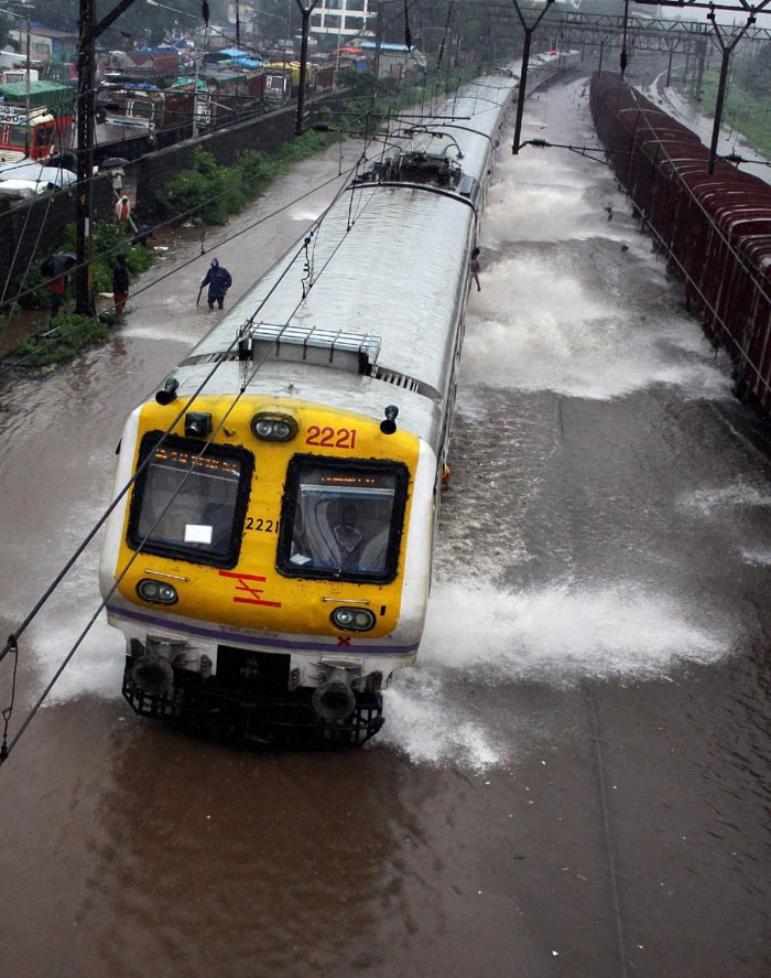 Not even flood can stop Mumbai trains!