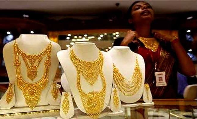 Indian gold futures hit over 7-month high as rupee falls | Business ...