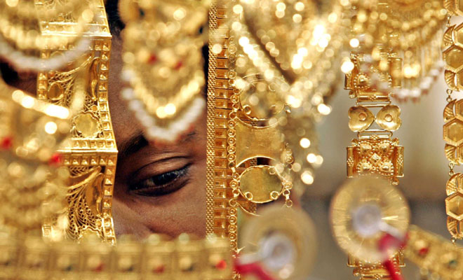 Gold futures decline to Rs 32,598 per 10 gm | Business News - The ...