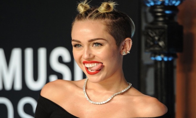 I am an adult acting like a kid: Miley Cyrus | Hollywood News - The ...