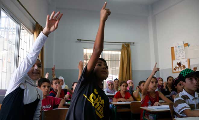 Syrian children return to school amid war | World News - The Indian Express