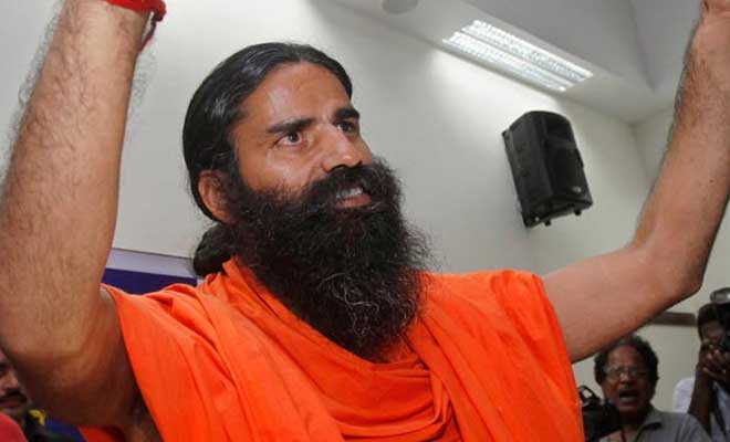 Assembly polls: With twisted truth,flexible logic,yoga guru Ramdev goes ...