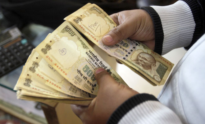 Indian rupee hits 61.96 against US dollar | Business News - The Indian ...
