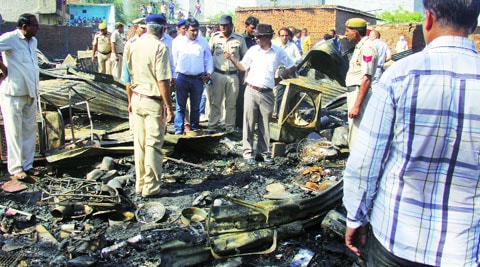 Day after fire, residents clash with officials over demolition | Delhi ...