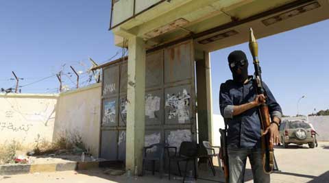 Benghazi death toll rises to 70 as Libyan forces battle militias ...