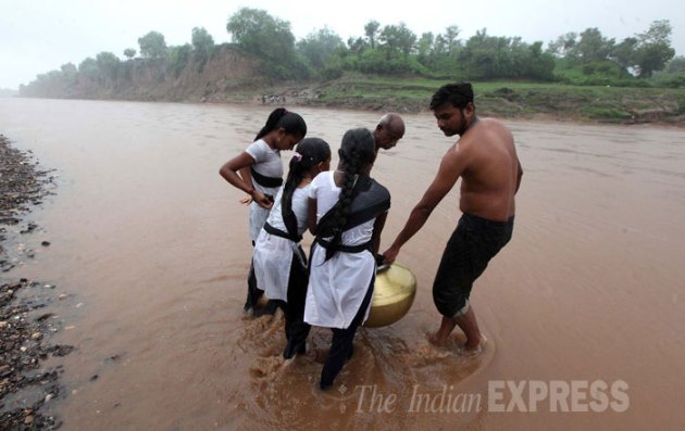 Gujarat kids swim daily to reach school | Picture Gallery Others News ...