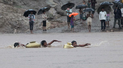 Gujarat kids swim daily to reach school | Picture Gallery Others News ...