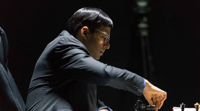 Viswanathan Anand beats Magnus Carlsen in 34 moves to win third game in ...