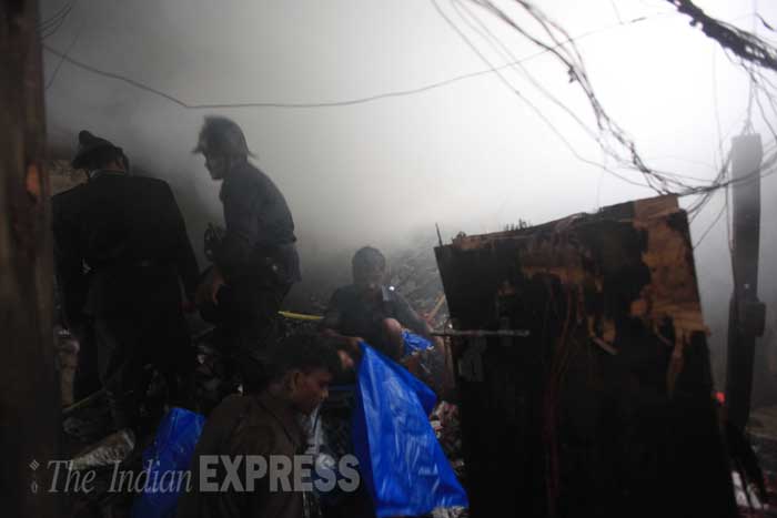 Mumbai three-storey building collapses after catching fire | Picture ...