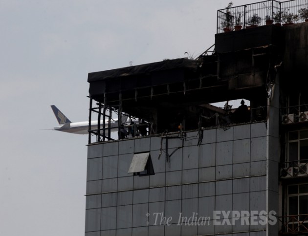 Mumbai three-storey building collapses after catching fire | Picture ...