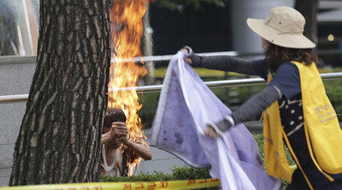 South Korean man sets himself on fire in anti-Japan rally, motives ...