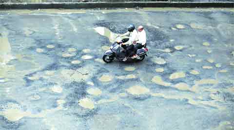Mumbai man, whose son died in accident, fills potholes to save others ...