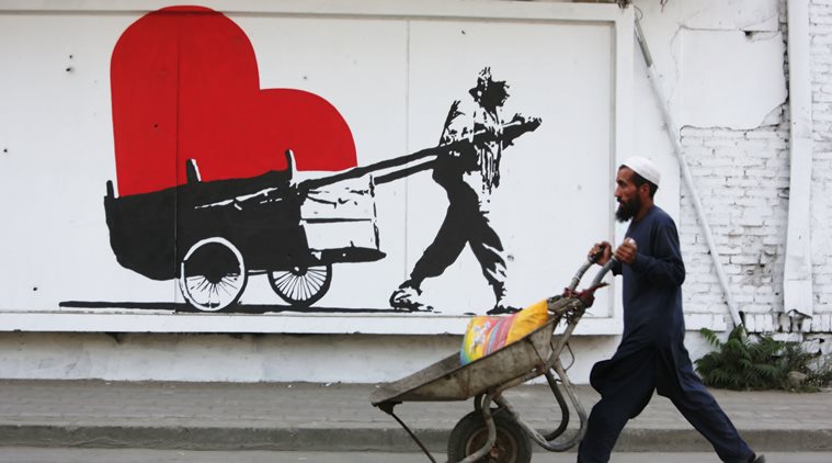 Afghan artist group paints quotidian ‘heroes’ on Kabul walls to heal ...