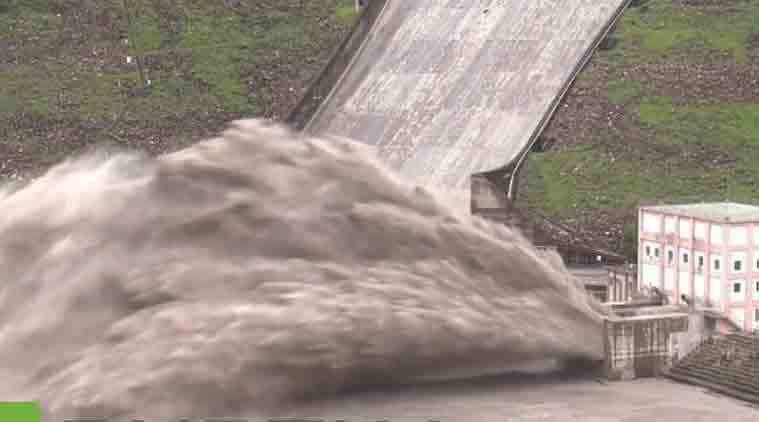 Flood waters jet out of Taiwan dam after deluge of Dujuan Typhoon ...