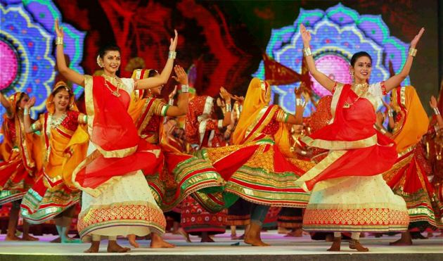 People take part in Dandiya Raas during Garba nights | Picture Gallery Others News - The Indian ...