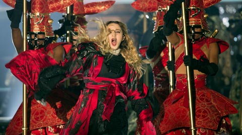Madonna cries onstage as she pays tribute to Paris victims | Music News ...