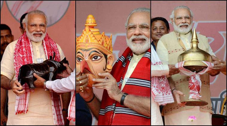 Narendra Modi in Assam: Mask, tribal jacket, wooden rhinoceros among ...