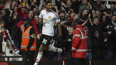 Marcus Rashford keeping his feet on the ground, says Michael Carrick ...
