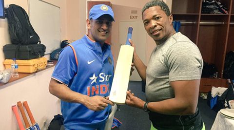 MS Dhoni gifts autographed bat to Makhaya Ntini | Cricket News - The ...