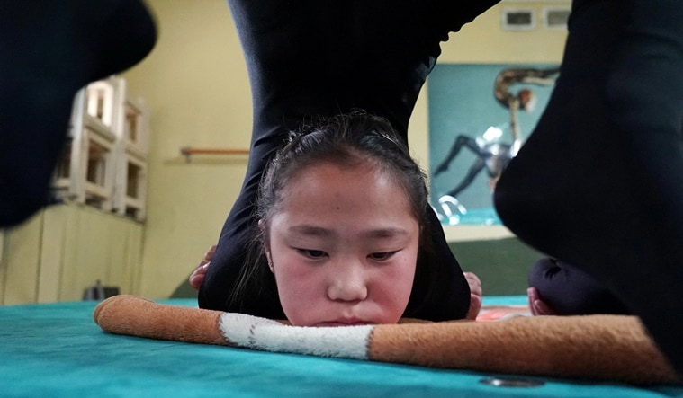 Twisting and stretching for global success: Going to contortionist ...