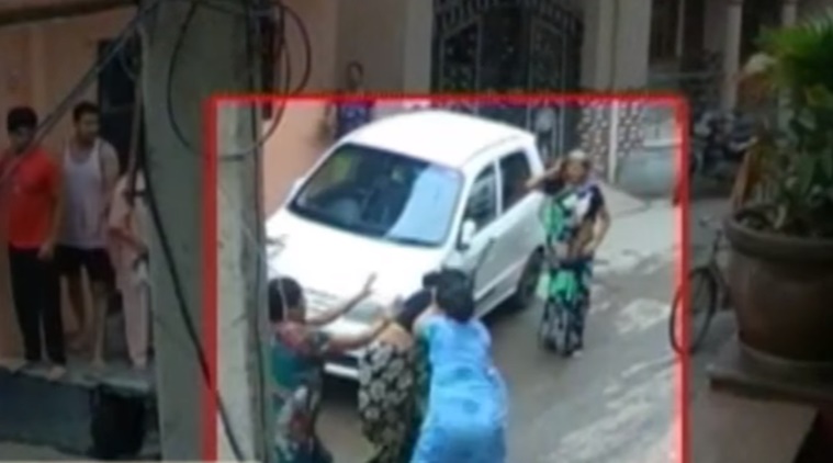 Video: CCTV captures women hitting, stoning each other over dog poop in ...