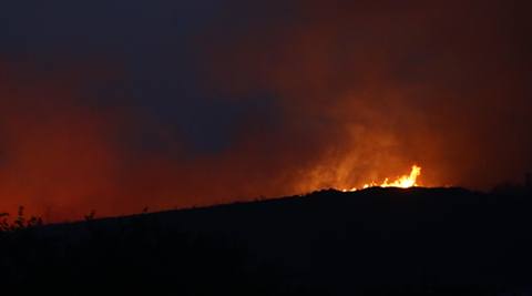 Brush fire near Rio Olympic sites rains down ash | Rio-2016-olympics ...