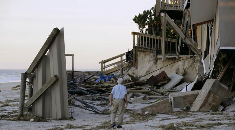 Hurricane Matthew whips North Carolina as it slowly exits East Coast ...