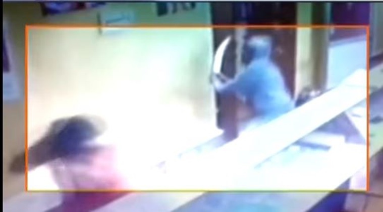 Caught on camera: Man attacks woman with sword in temple, video goes ...
