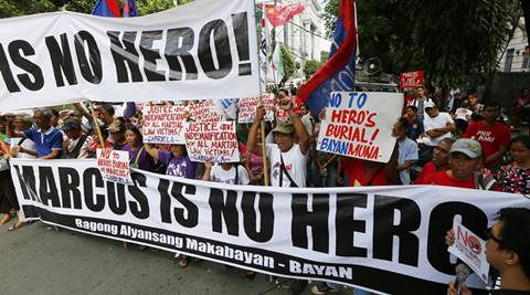 Despite protests, Ferdinand Marcos is buried at heroes’ cemetery in ...