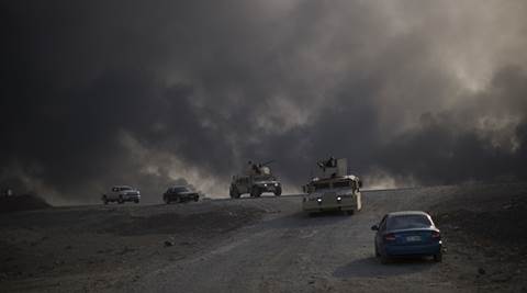 Fear and relief at Iraqi checkpoint on escape route from Mosul | World ...