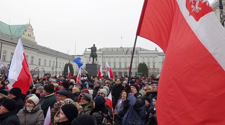 Poland: Police force protesters away from parliament, put up barriers ...