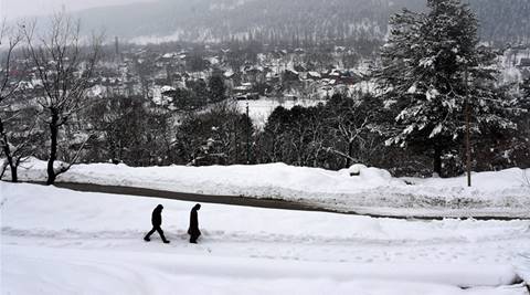 Kashmir: Snowfall snaps land, air links to Valley | India News - The ...