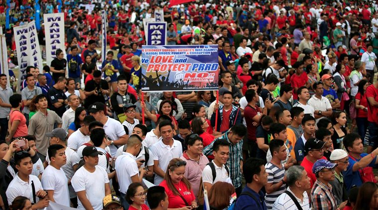 Thousands protest in Manila as President Duterte jails top critic ...