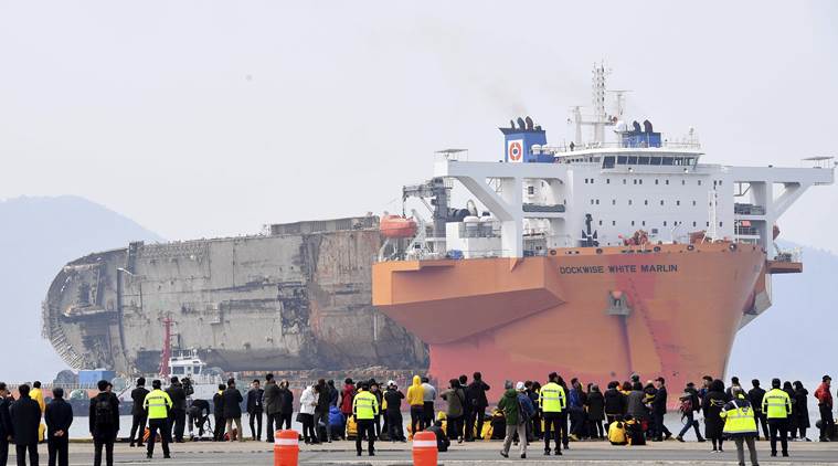 Raised South Korean ferry Sewol arrives at port for search | World News ...