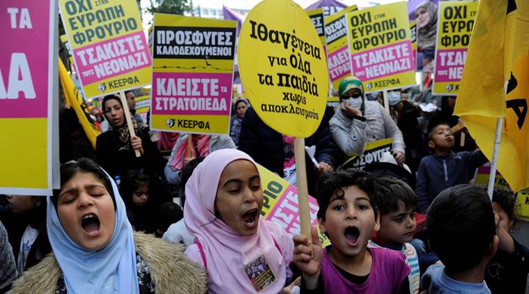 Refuge-seekers protest against EU-Turkey deal in Greek island | World ...