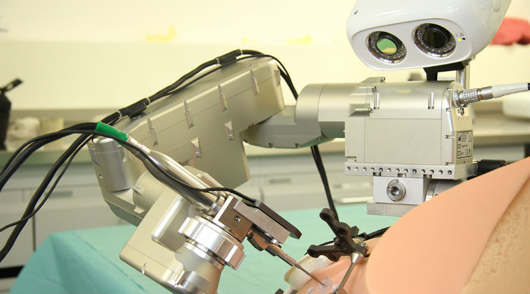 Robot assists risky ear-implant surgery for the first time | Technology ...