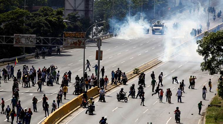 Caracas erupts as Venezuelans protest against President Nicolas Maduro ...
