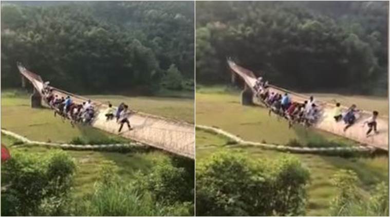 WATCH: Scary video showing people hanging by the railing on a bridge in ...