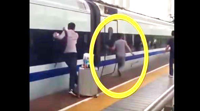 WATCH: Man gets finger stuck in the door of a running bullet train in ...