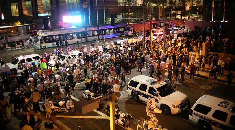 Police use gas to disperse protesters outside Donald Trump rally in ...