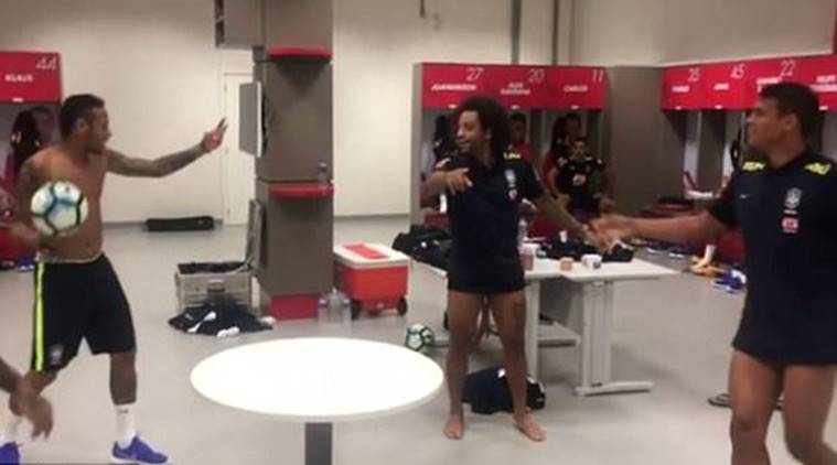 Neymar plays table football in dressing room with Brazil teammates ...