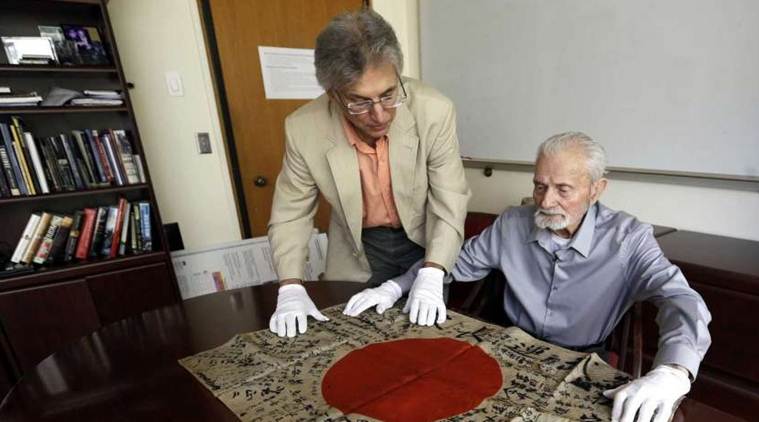WWII veteran, 93, brings back flag taken from enemy soldier | World ...