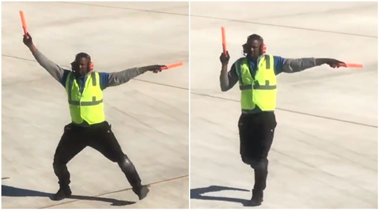 VIDEO: Airport ground personnel DANCES while giving signals to the ...