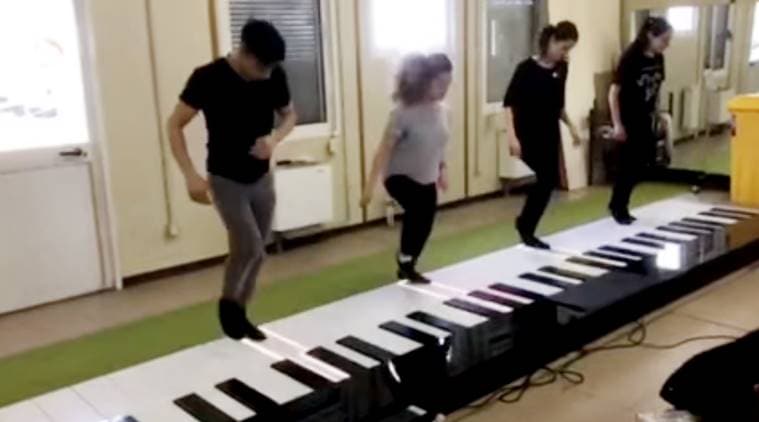 WATCH: This group dancing on a giant piano floor to Despacito will blow ...