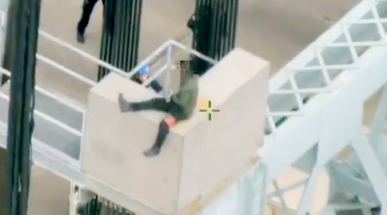 WATCH: NYPD police officer stops man from jumping off a bridge in this ...