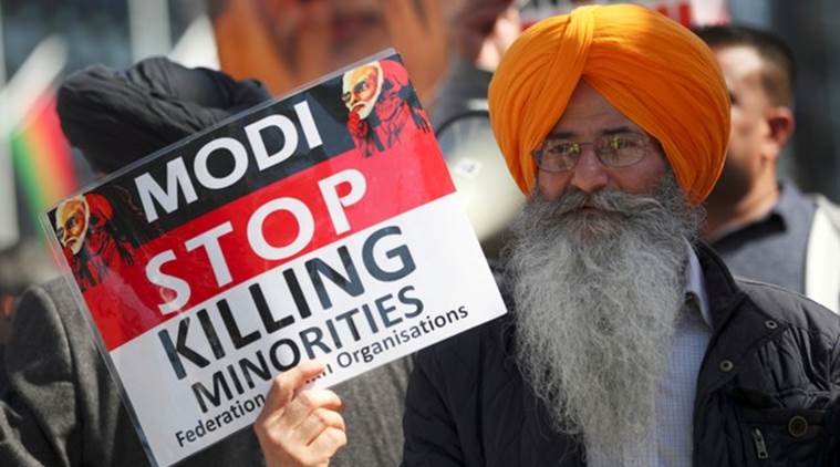 PM Modi in UK: Tricolour ripped as protests turn violent | India News ...