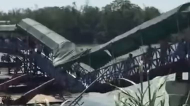 VIDEO: Bridge in China collapses due to weight but tourists continue to ...